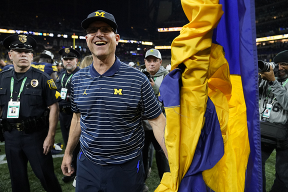 Head football coach Jim Harbaugh calls Michigan President Santa Ono to ...